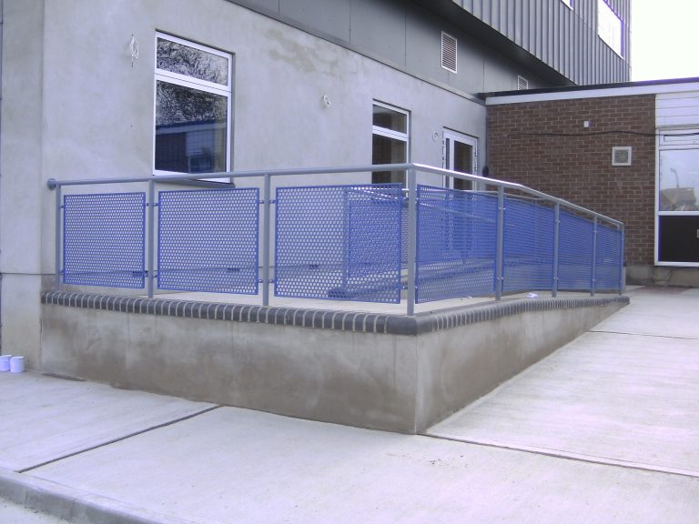 Stainless steel handrail with panel infill | W Farthing & Sons